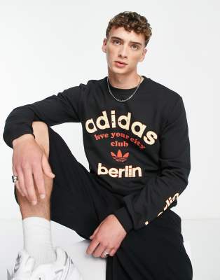 Sudadera negra con logo Berlin de adidas Originals | ASOS