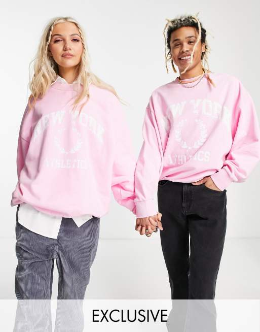 Sudadera rosa lavado unisex con estampado gráfico "New York" de ...
