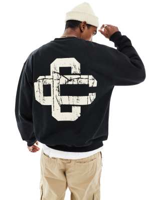 The Couture Club cracked print emblem sweatshirt in black | ASOS