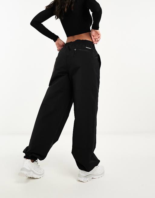 The North Face Easy Wind track pants in black | ASOS The North Face Easy Wind track pants in black | ASOS