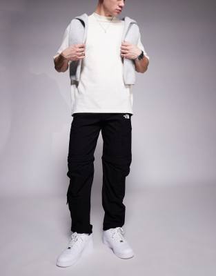 The North Face Exploration convertible utility tapered pants in black ...