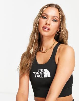 The North Face Flex medium support sports bra in black | ASOS