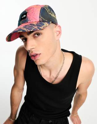 The North Face NSE Explore tech cap in pink distort print | ASOS