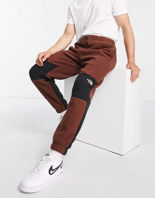 The North Face Shispare high pile fleece trackies in dark oak brown ...