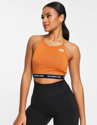 The North Face strap back crop top with logo hem in orange Exclusive at ...