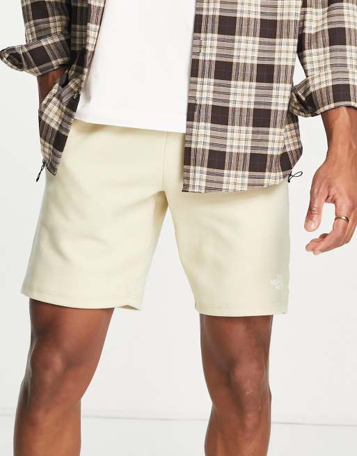 The North Face Tech shorts in beige Exclusive at ASOS | ASOS