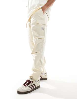 Timberland - Pantalon cargo en tissu ripstop avec étiquette logo ...
