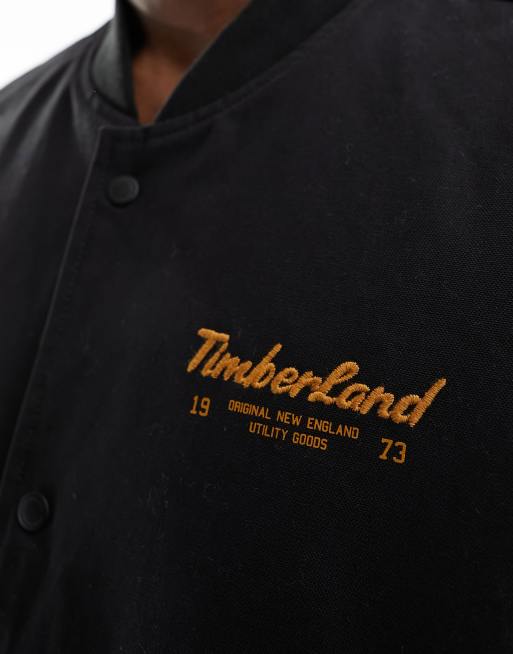 Timberland utility varsity bomber jacket with back print in black | ASOS
