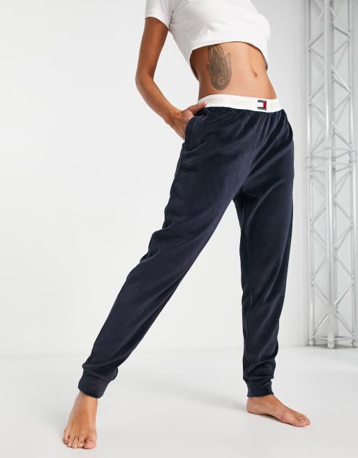 Tommy Hilfiger velour trackies in black | ASOS