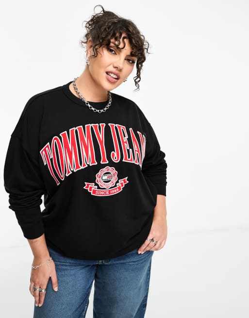Tommy Jeans Plus varsity logo crew neck sweater in black | ASOS