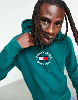 Tommy Jeans timeless logo hoodie in washed green | ASOS