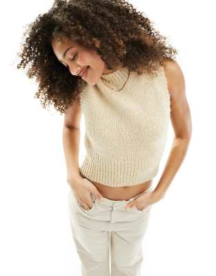 Top color avena sin mangas estilo tabardo de punto de New Look | ASOS