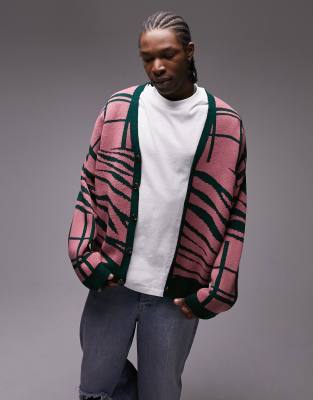 Topman oversized knitted cardigan with splice animal check in pink | ASOS