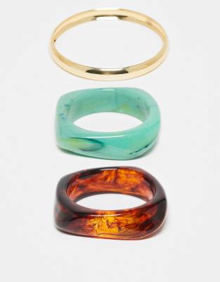 Topshop Bali multi pack chunky bangles in brown and green | ASOS