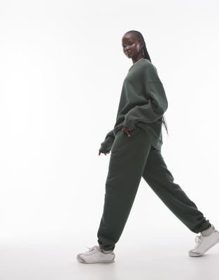 Topshop cuffed trackies in dark green (part of a set) | ASOS