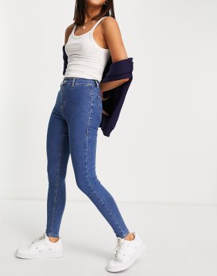 Topshop high rise Joni jeans in mid blue | ASOS