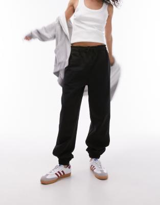 Topshop oversized cuffed trackies in black | ASOS