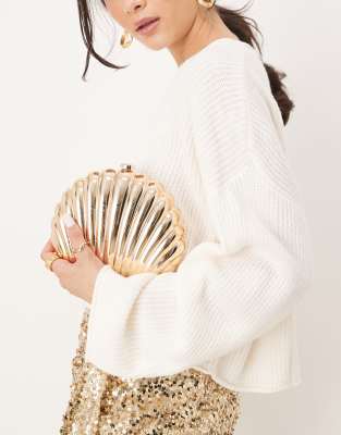 True Decadence shell clutch bag in gold | ASOS