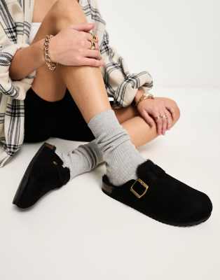 Truffle Collection faux fur lined mules in black | ASOS