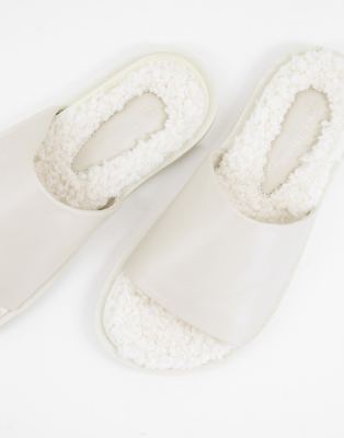 Truffle Collection fur footbed sliders in cream | ASOS