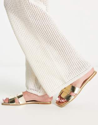 Truffle Collection glam slip on mule sliders in gold | ASOS