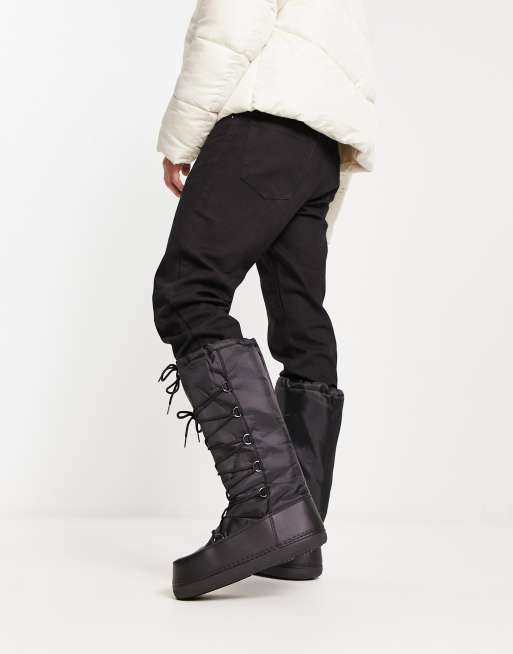 Truffle Collection high leg snow boots in black | ASOS