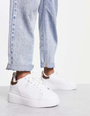 Truffle Collection sneakers in white with rose gold tab | ASOS