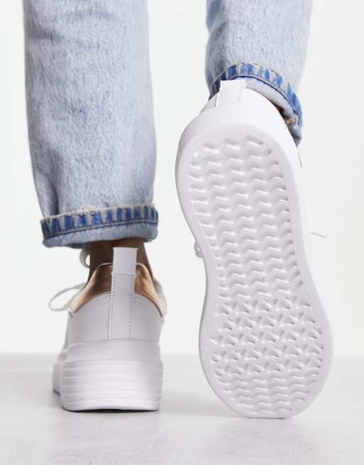Truffle Collection sneakers in white with rose gold tab | ASOS