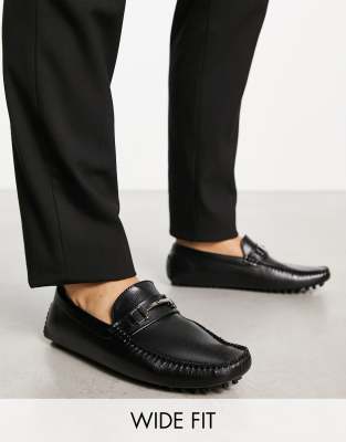 Truffle Collection wide fit faux leather metal trim drivers in black | ASOS