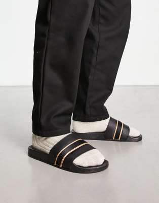 Truffle Collection wide fit gold print sliders in black | ASOS