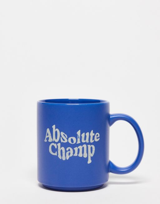 Typo mug with 'absolute champ' slogan in blue | ASOS