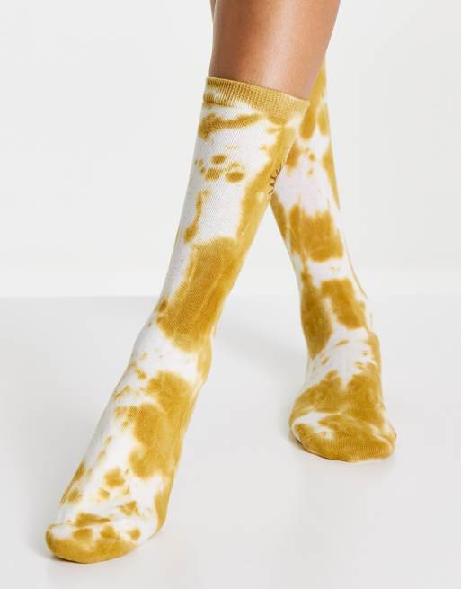 Typo socks with 'kind human' slogan in yellow tie dye | ASOS