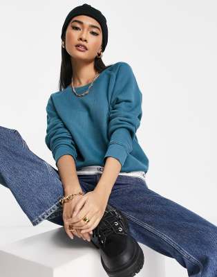 UGG - Nena - Sweat avec ourlet à bande logo - Bleu moyen | ASOS