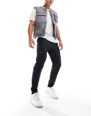 Under Armour - Unstoppable - Pantalon de jogging fuselé - Noir | ASOS