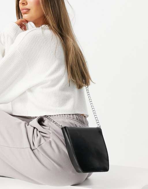 Urbancode leather cross body chain strap bag in black | ASOS