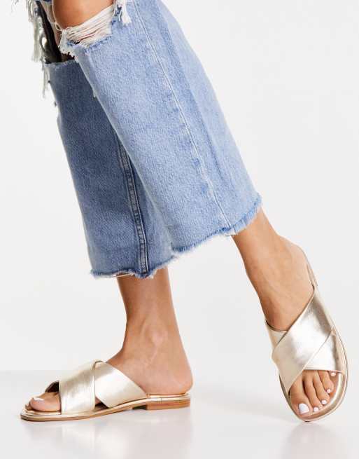 Vero Moda leather cross over flat sandals in gold | ASOS