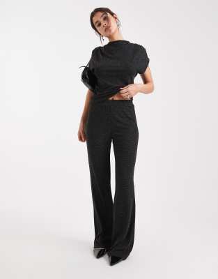 Vero Moda – Svart och silverfärgade byxor med vida ben och glitter, del ...