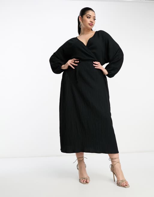 Vestido midi negro cruzado con lazada lateral de tejido rugoso de ASOS DESIGN Curve | ASOS