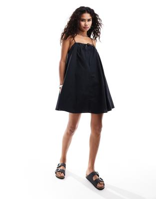 Weekday Mika floaty cami mini sun dress in black | ASOS
