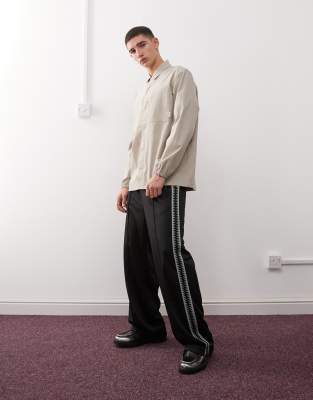 Weekday - Pantalon de jogging ample avec bande sur le côté - Noir | ASOS