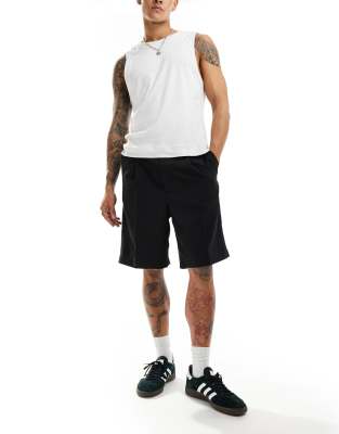 Weekday Uno loose fit tailored shorts in black | ASOS
